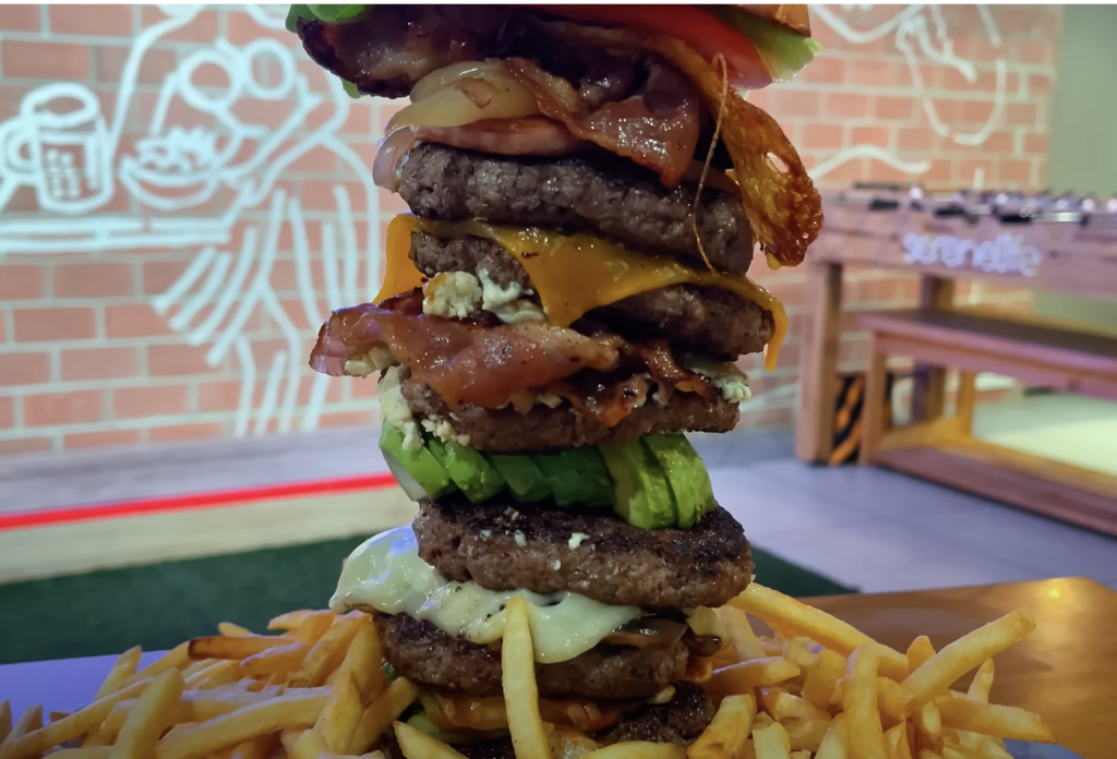 Randy Santel Takes on the 8-Patty “Aloha” Hawaiian Cheeseburger ...